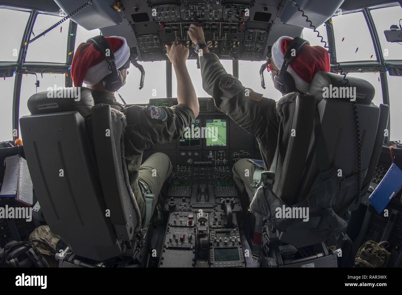 Lt. Col. Barry A. King, 374th Operations Group deputy commander, left ...