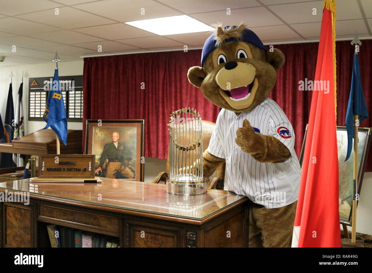 Clark, the Chicago Cubs mascot, poses alongside the 2016 World Series ...