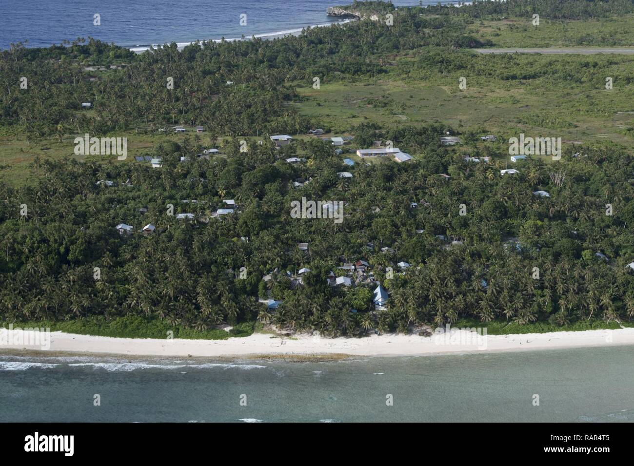 A village on Fais Island, Federated States of Micronesia, anticipates ...