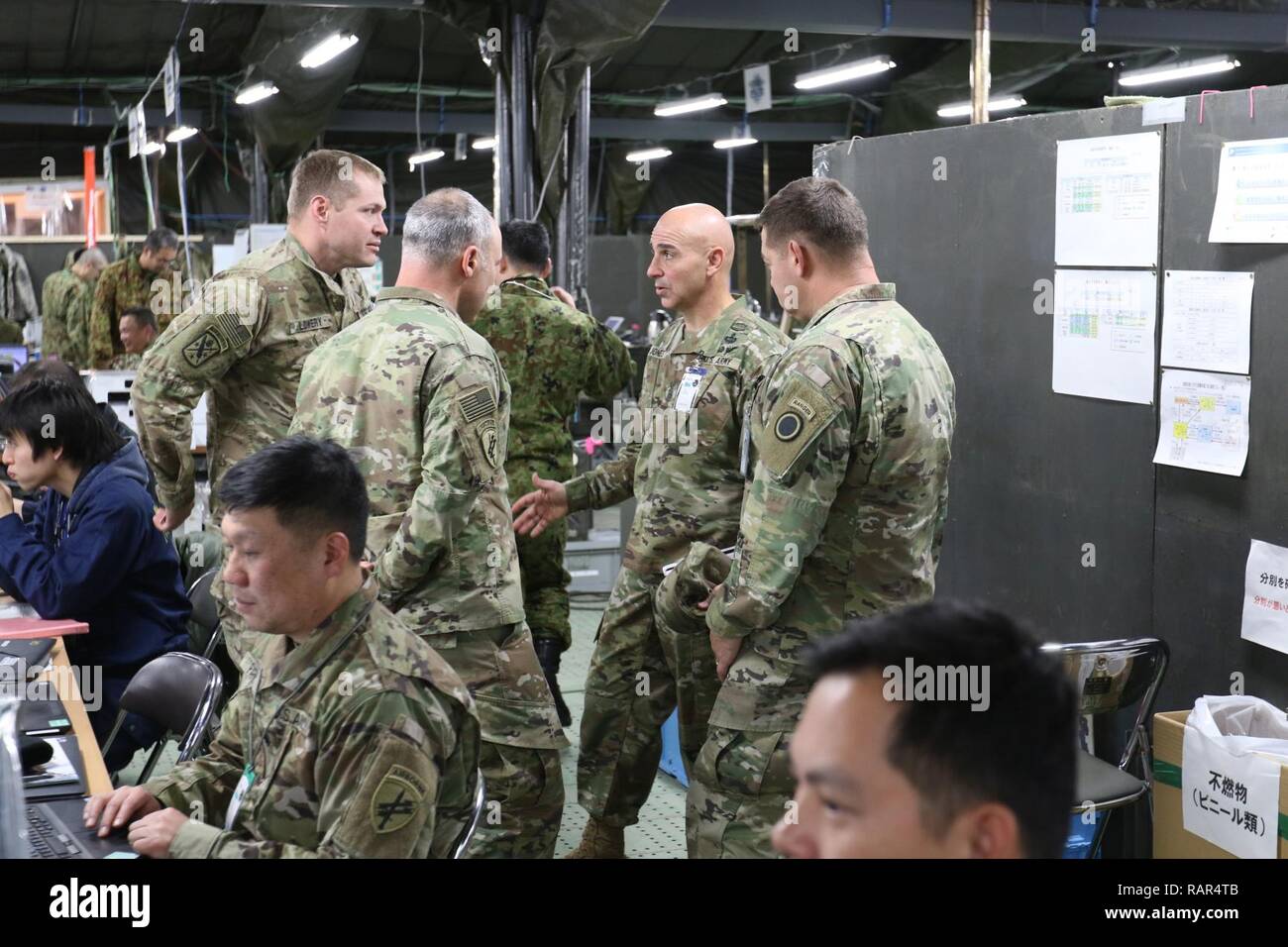 Command Sgt. Maj. Benjamin Jones (second from the right), United States ...