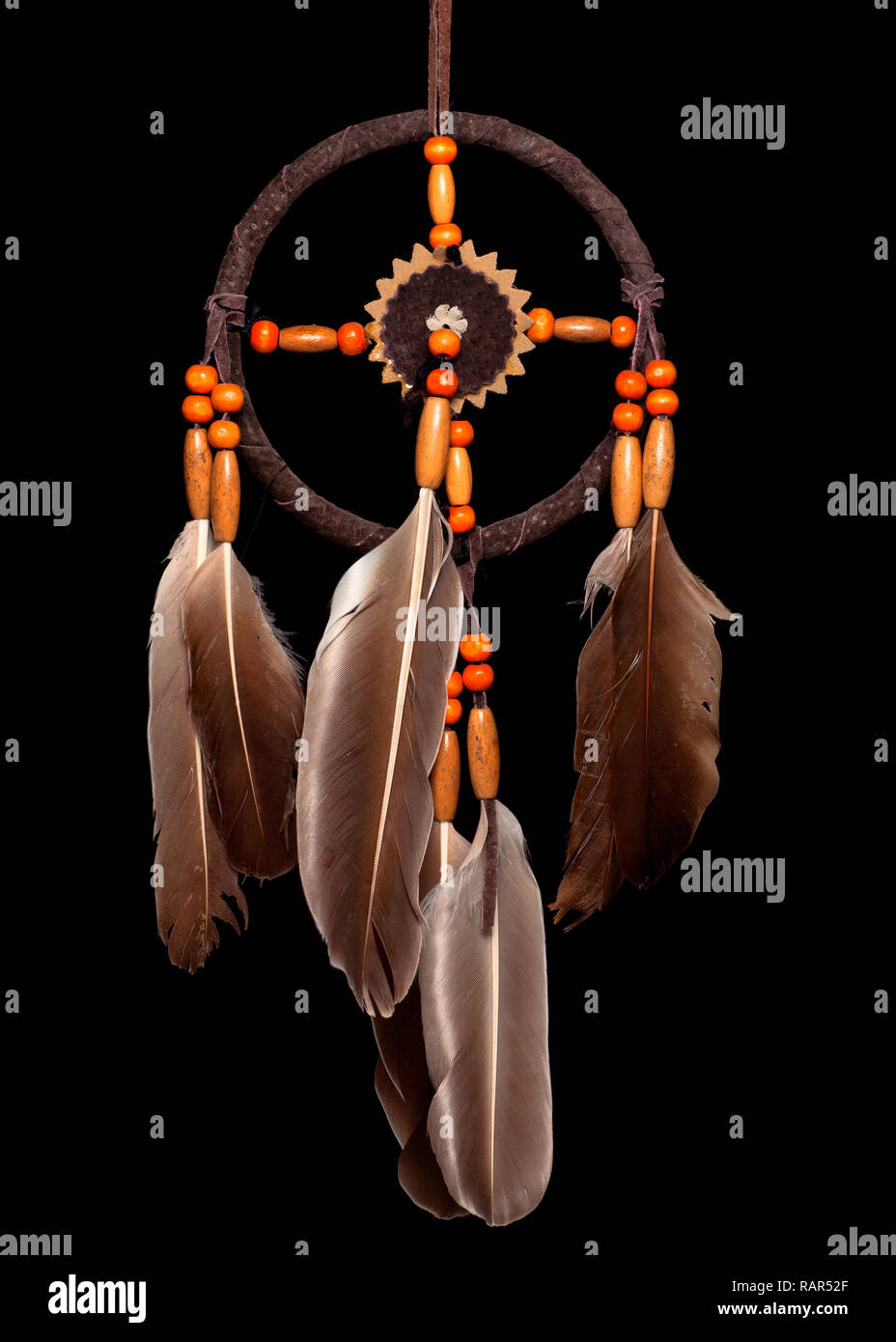 Traditional native dreamcatcher isolated on black Stock Photo - Alamy