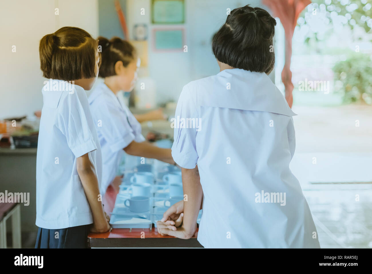 Students prepare snack and beverage for conference lunch break Stock ...