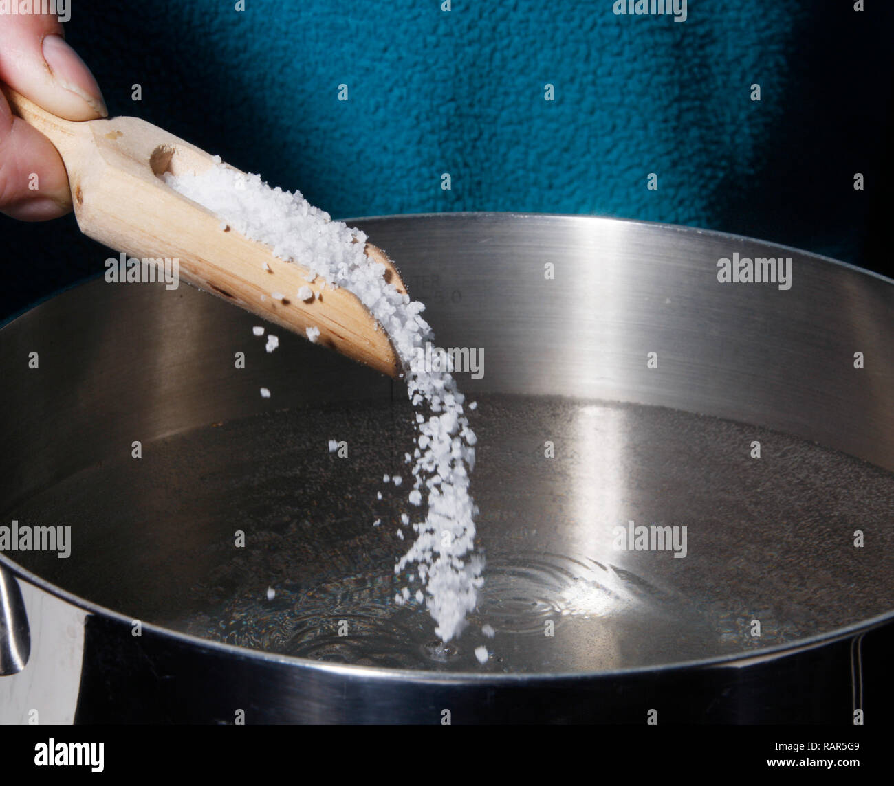 Adding Salt into Water Stock Photo - Alamy