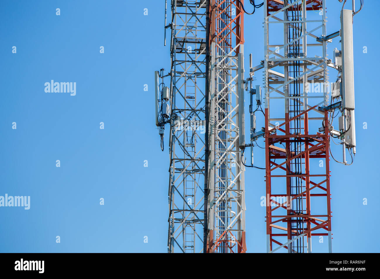closeup communication tower metal frame isolated on blue sky Stock ...