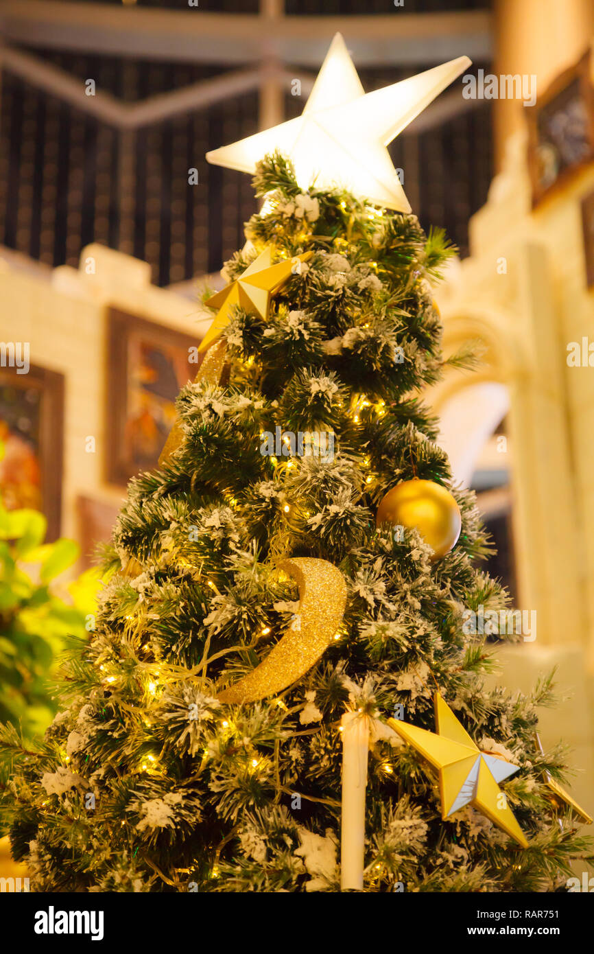 Glittering star, crescent moon and ball baubles background with ...