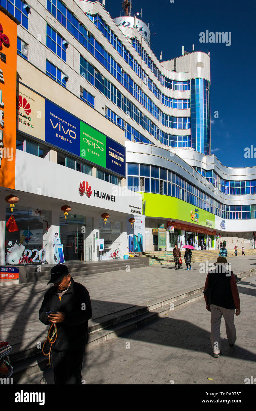 Modern architecture in the Chinese-ified Tibetan city of Lhasa Stock ...