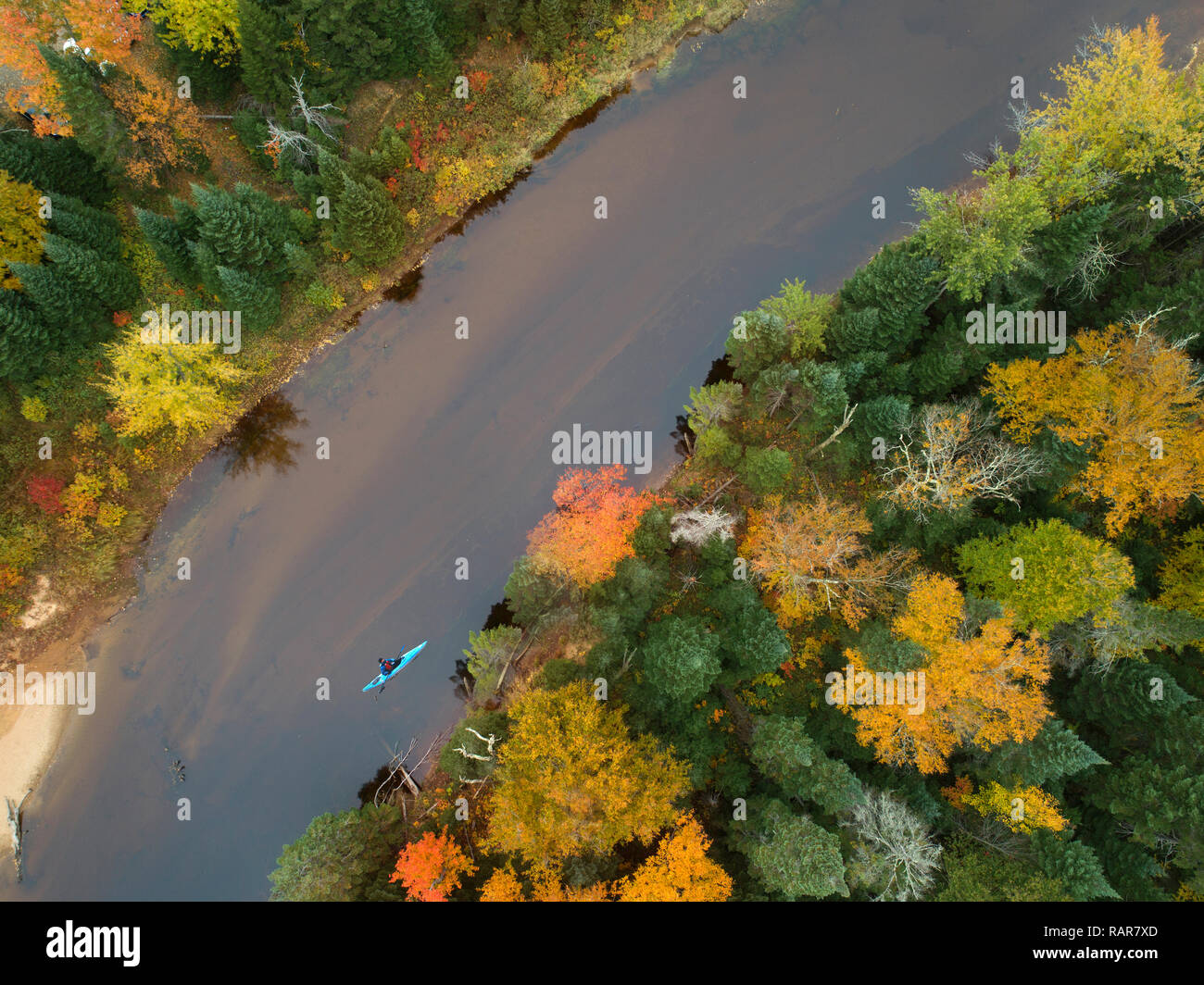 Canoe in Fall Colours Stock Photo - Alamy