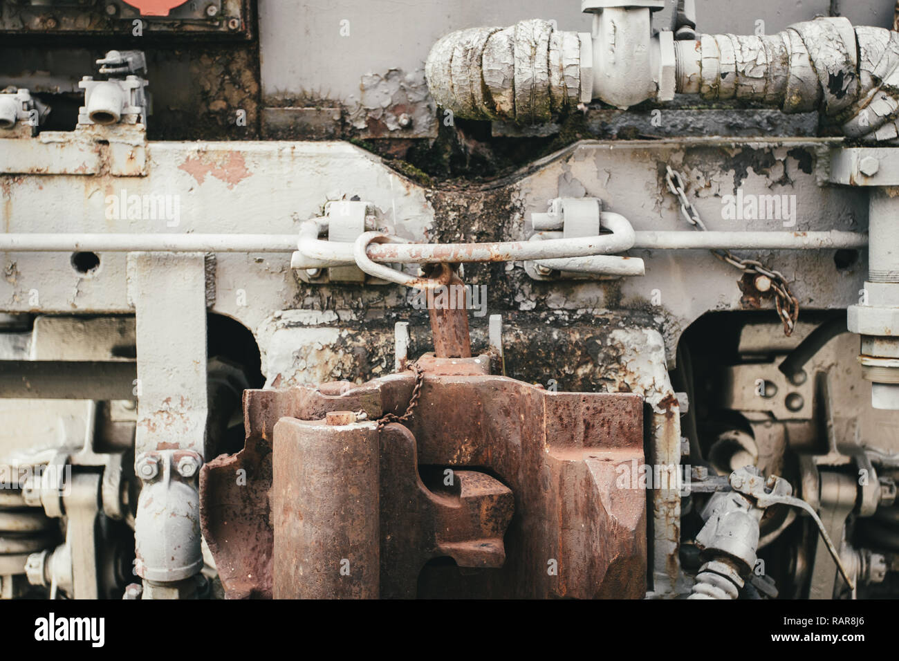 Close-up photo of the rusted metal components of a train car Stock ...