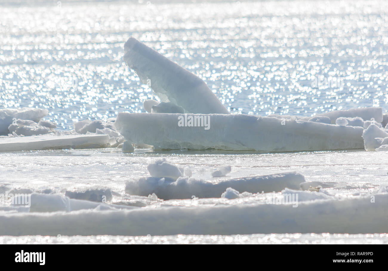 Huge chunks of ice on the river during the ice drift Stock Photo - Alamy