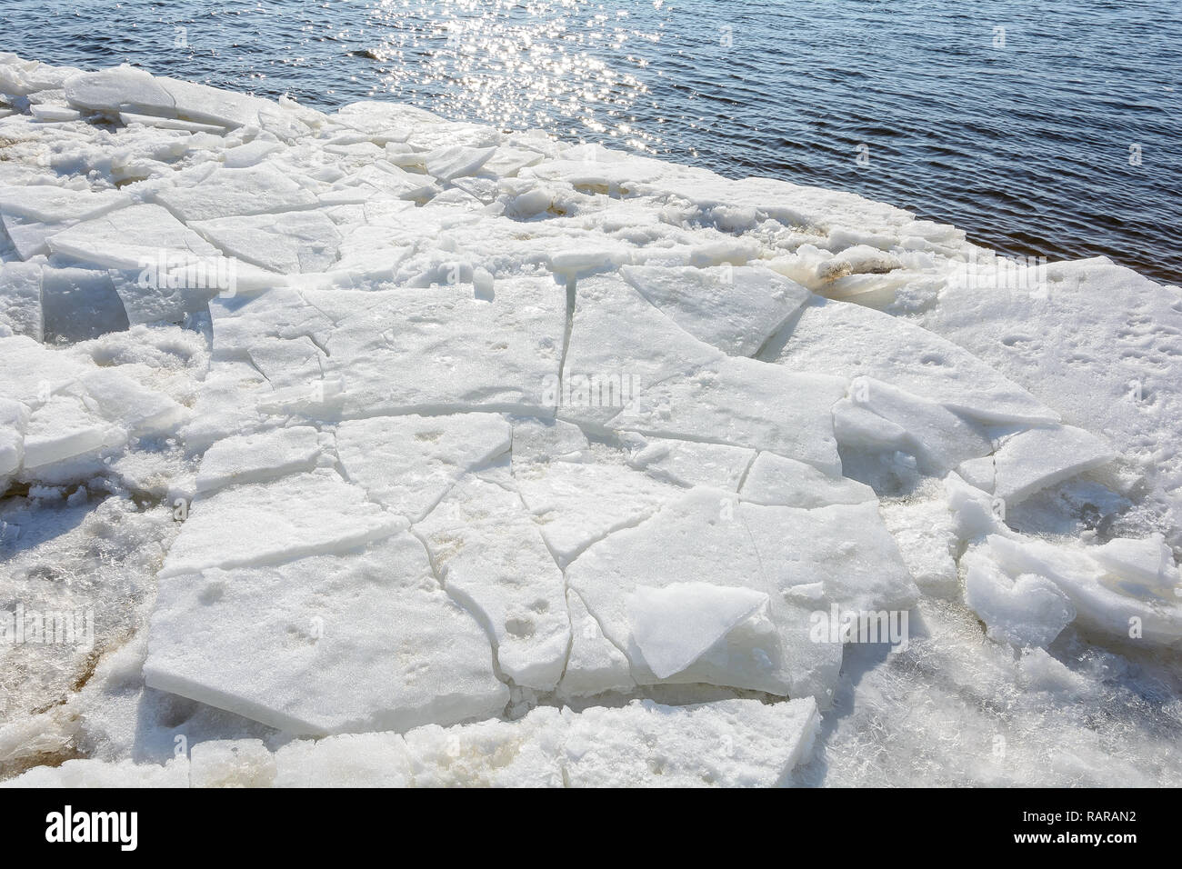 Huge chunks of ice on the river during the ice drift Stock Photo - Alamy