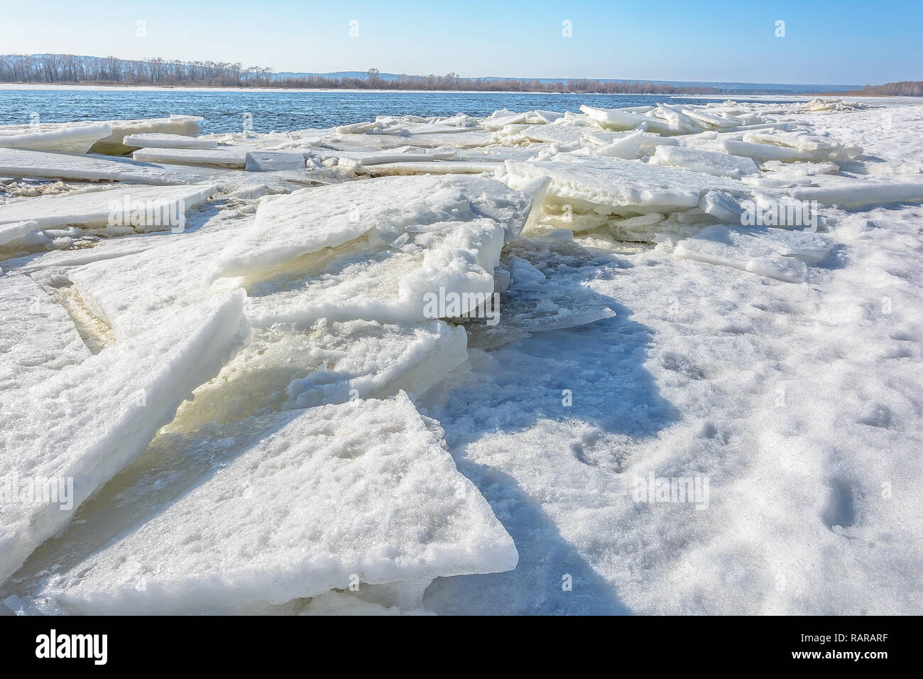 Huge chunks of ice on the river during the ice drift Stock Photo - Alamy