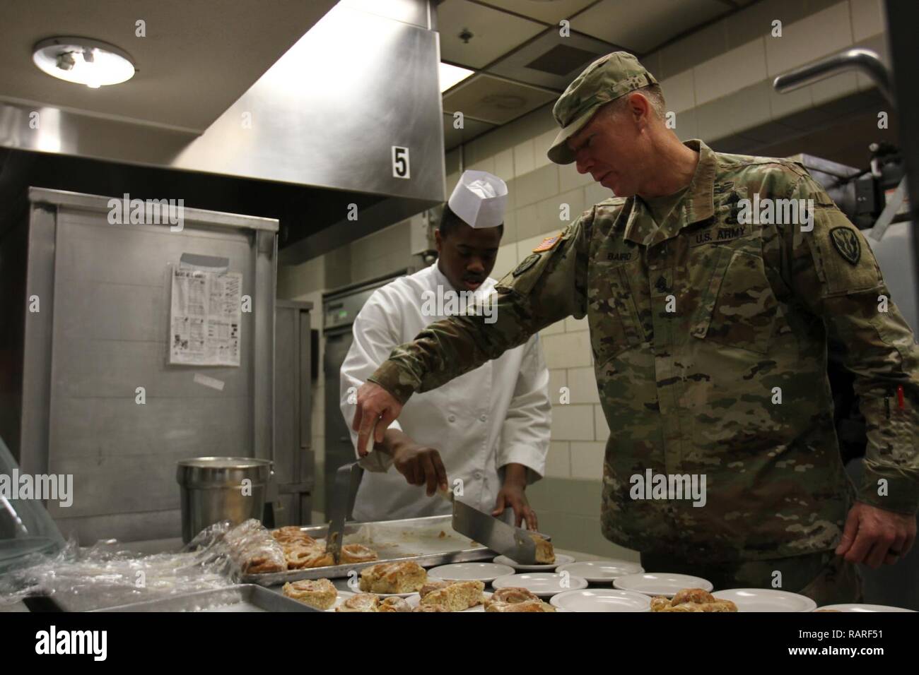 Command Sgt. Maj. Thomas Baird, right, 504th Military Intelligence ...