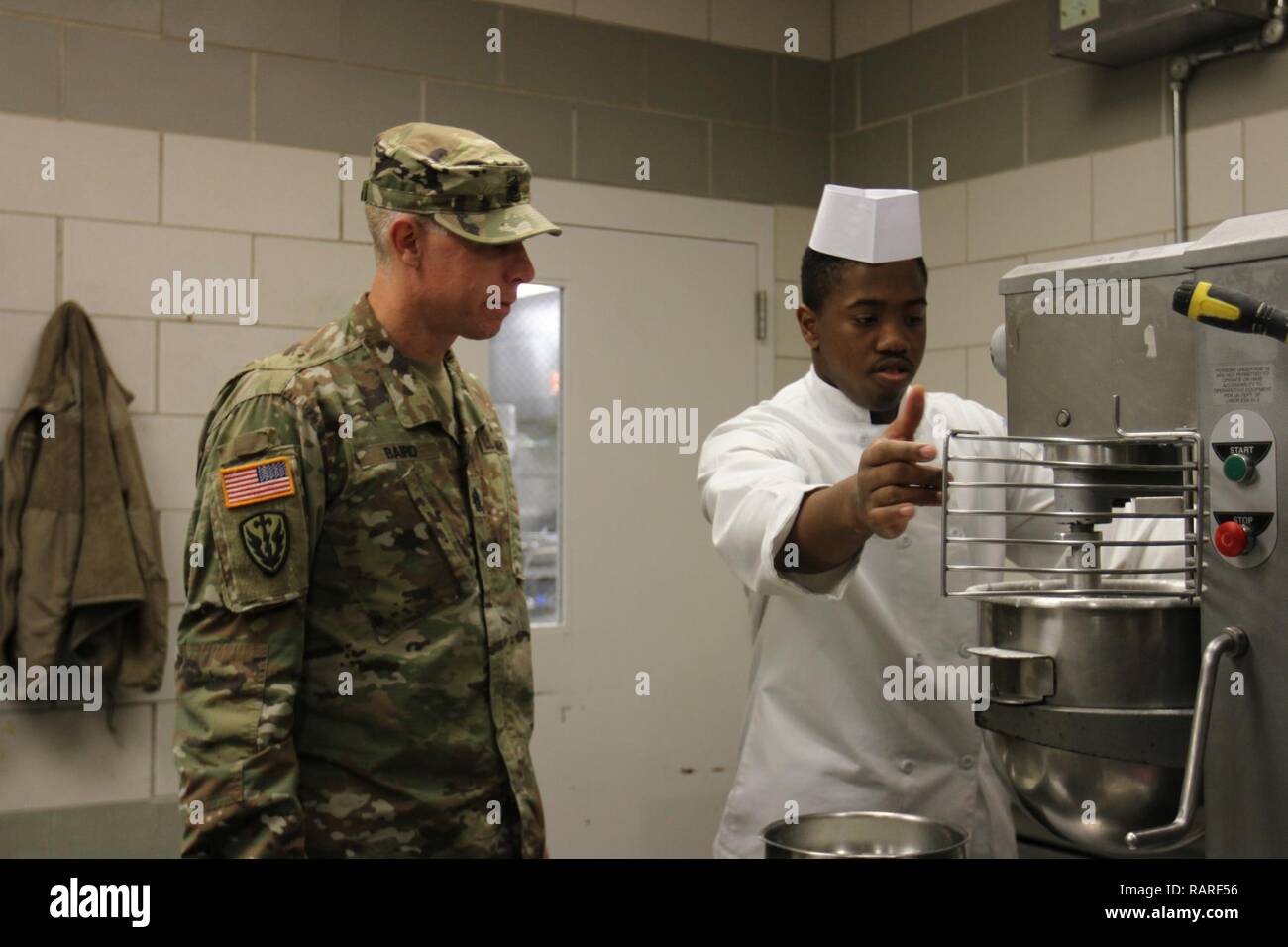 Spc. Tervaris Marshall, right, 303rd Military Intelligence Battalion ...