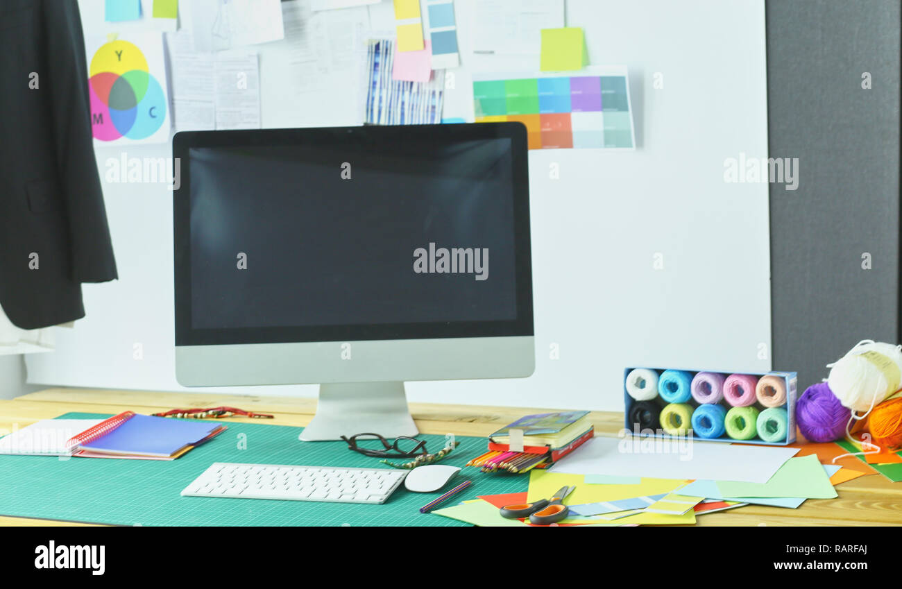 Empty workroom and workplace of tailor or vendor of clothes in small ...
