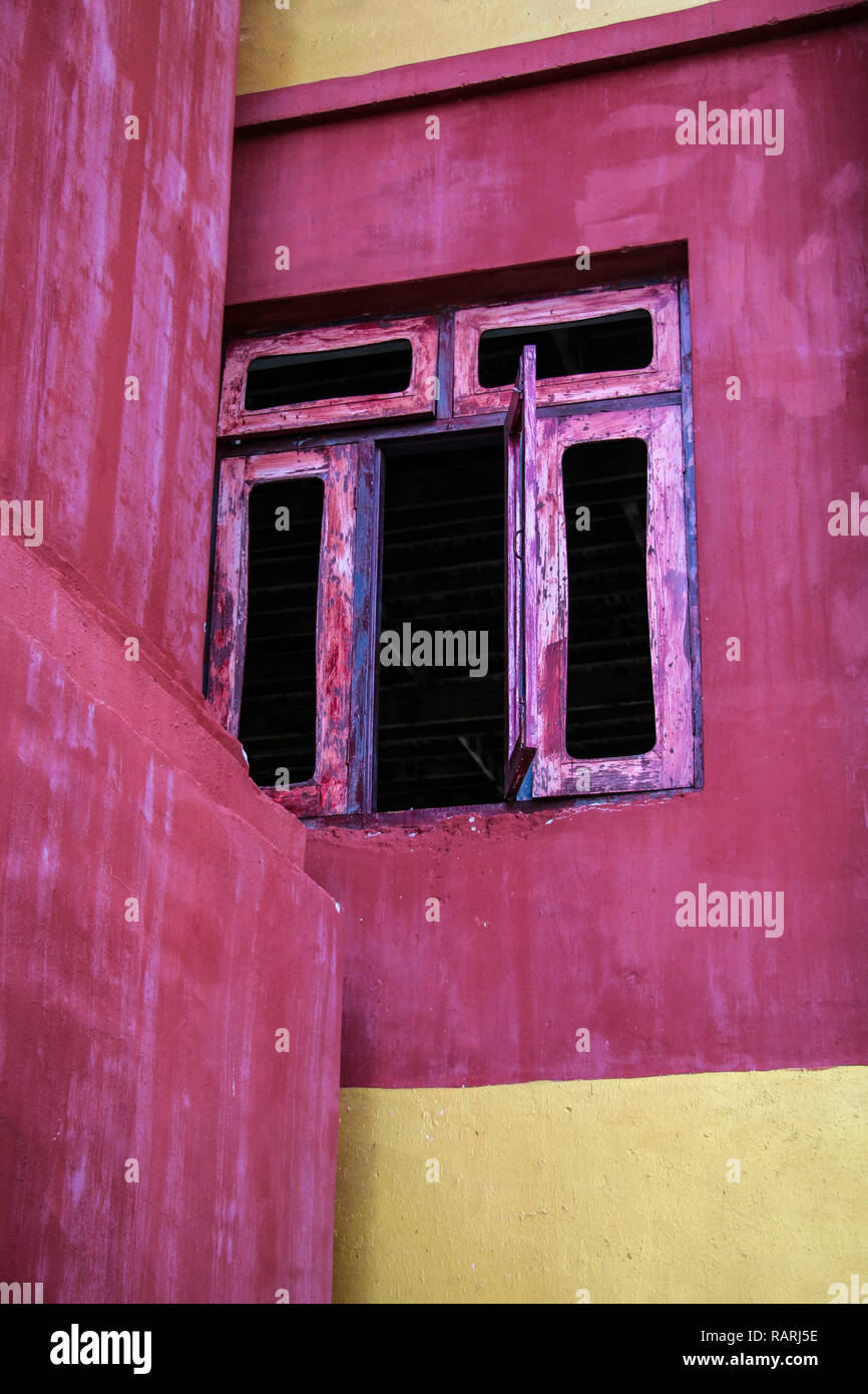Open window on the red wall Stock Photo - Alamy