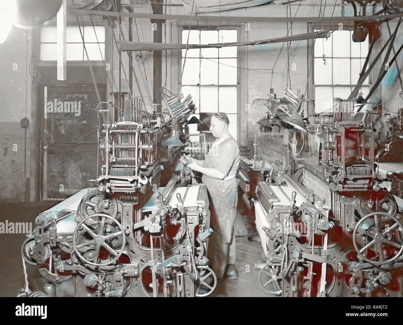Paterson, New Jersey - Textiles. Weaver operating four-loom system. He ...