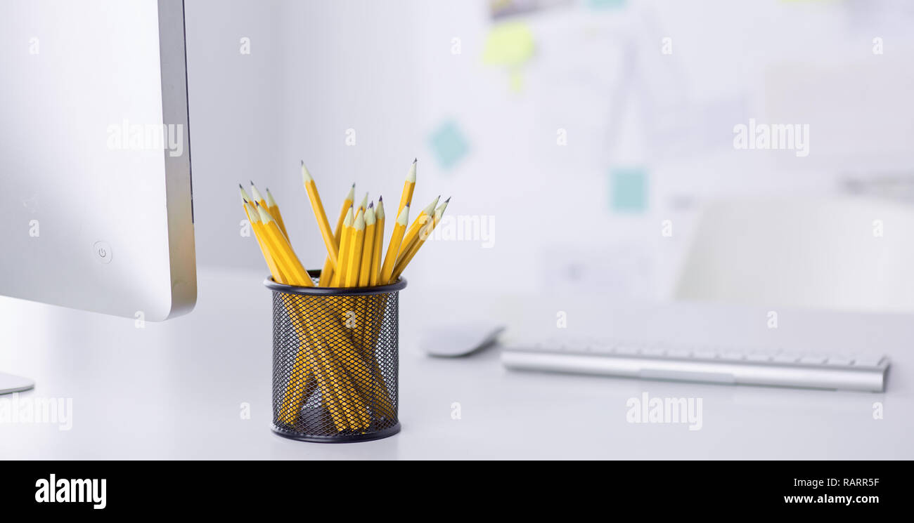 Graphite pencils in a metal grid-container. Concept Stock Photo - Alamy