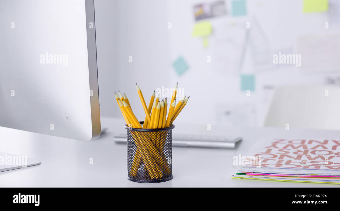 Graphite pencils in a metal grid-container. Concept Stock Photo - Alamy