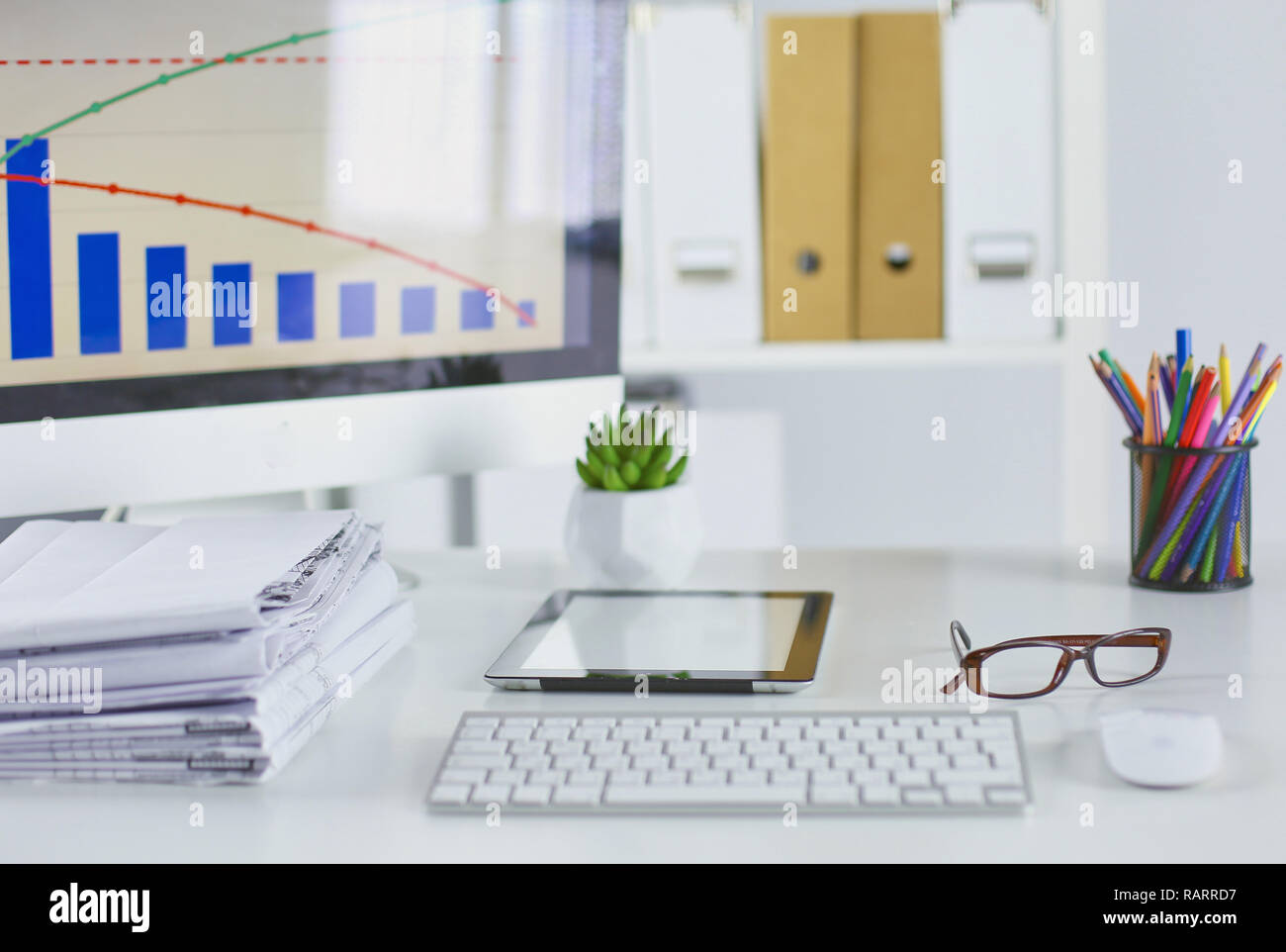 Workspace desktop, documents on the office table Stock Photo - Alamy