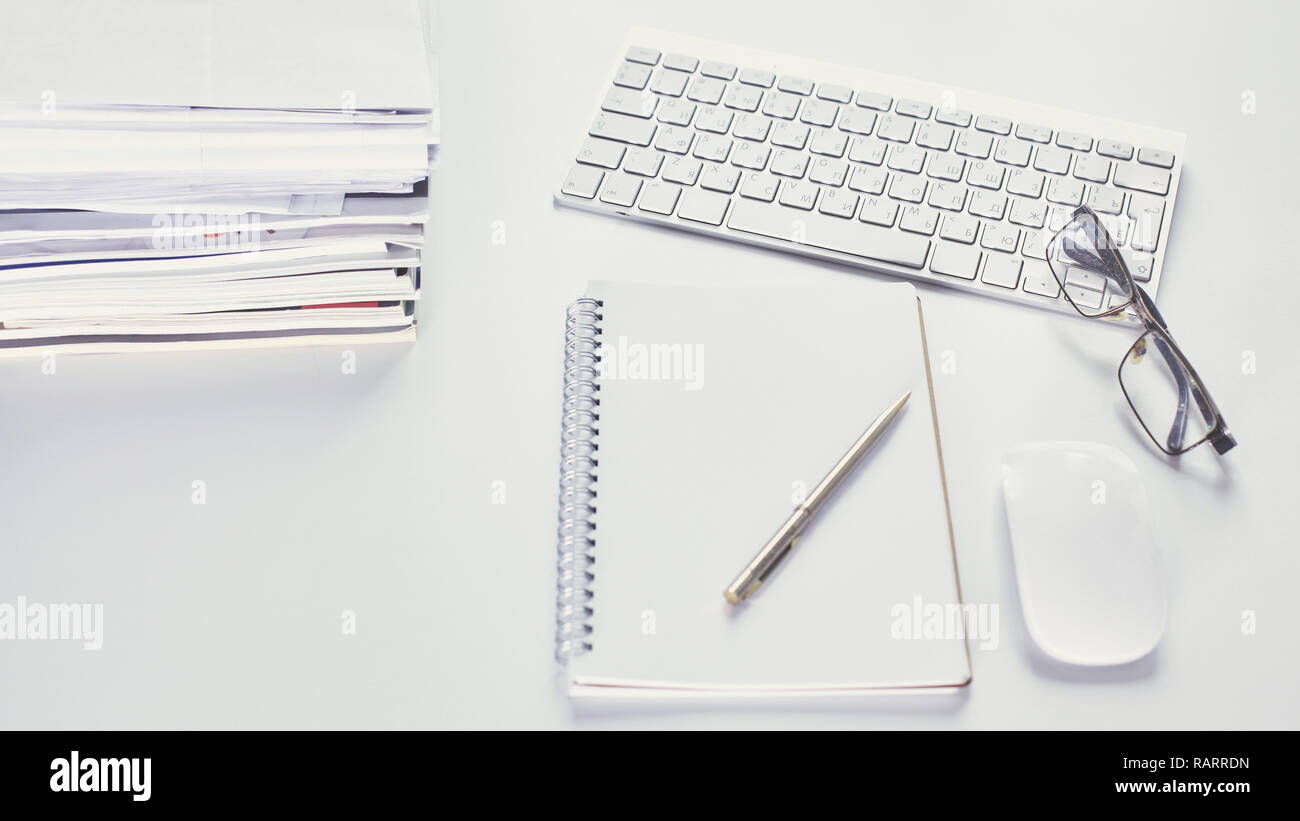 Workspace desktop, documents on the office table Stock Photo - Alamy