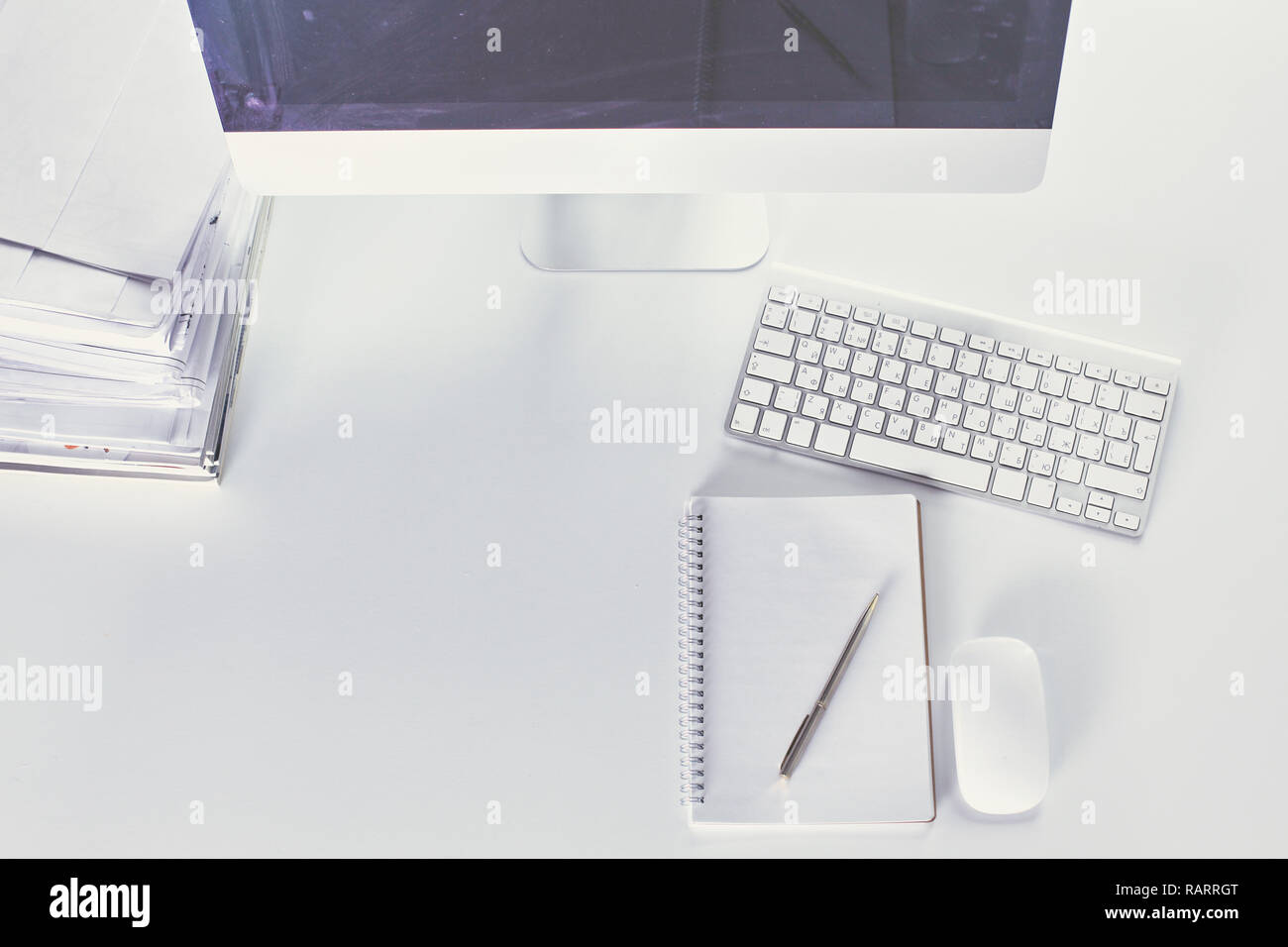 Workspace desktop, documents on the office table Stock Photo - Alamy
