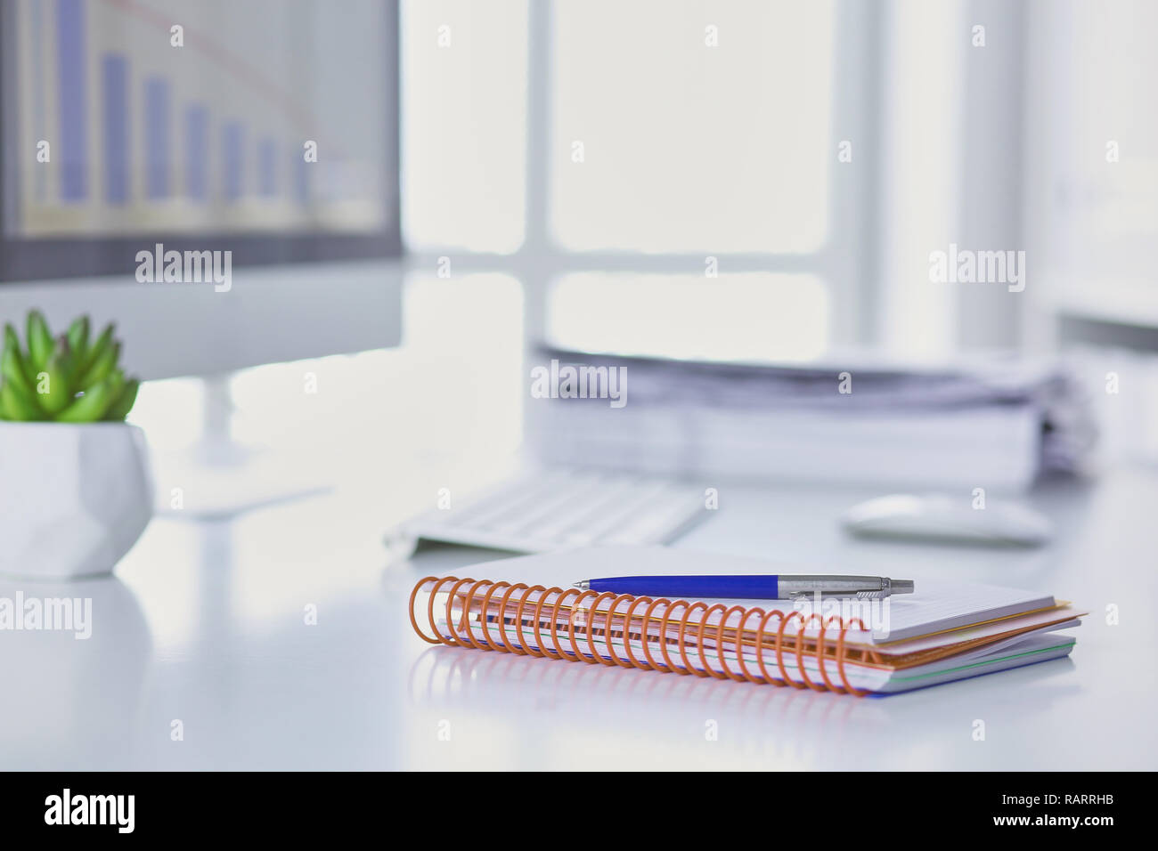 Workspace desktop, documents on the office table Stock Photo - Alamy