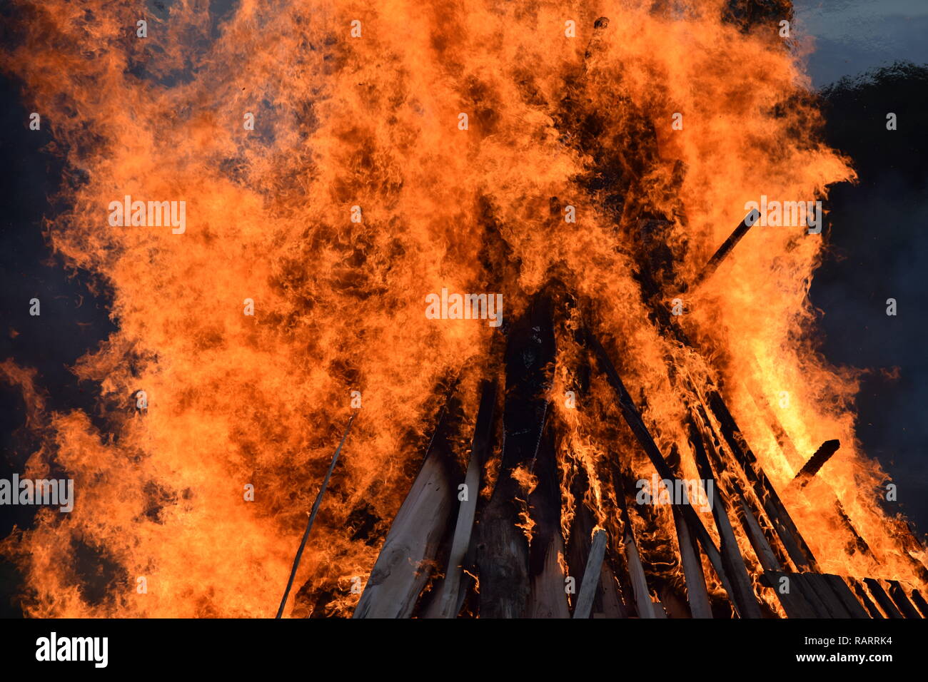 burning Pile with Wood for Solstice celebration Stock Photo - Alamy