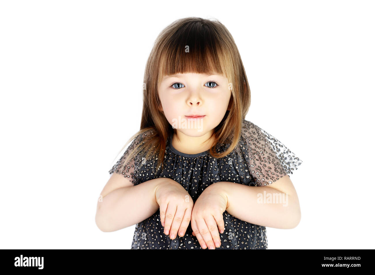 Begging girl with big innocent eyes, holding hands folded, isolated on ...