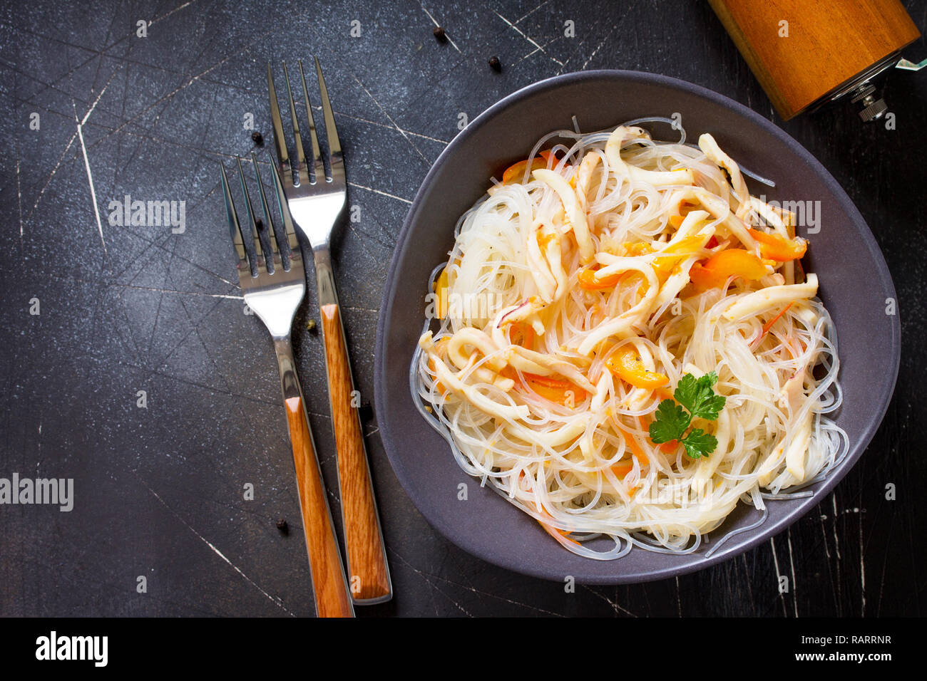 Asian food, Funchoza salad with stir fry Squids and Vegetables. Top ...