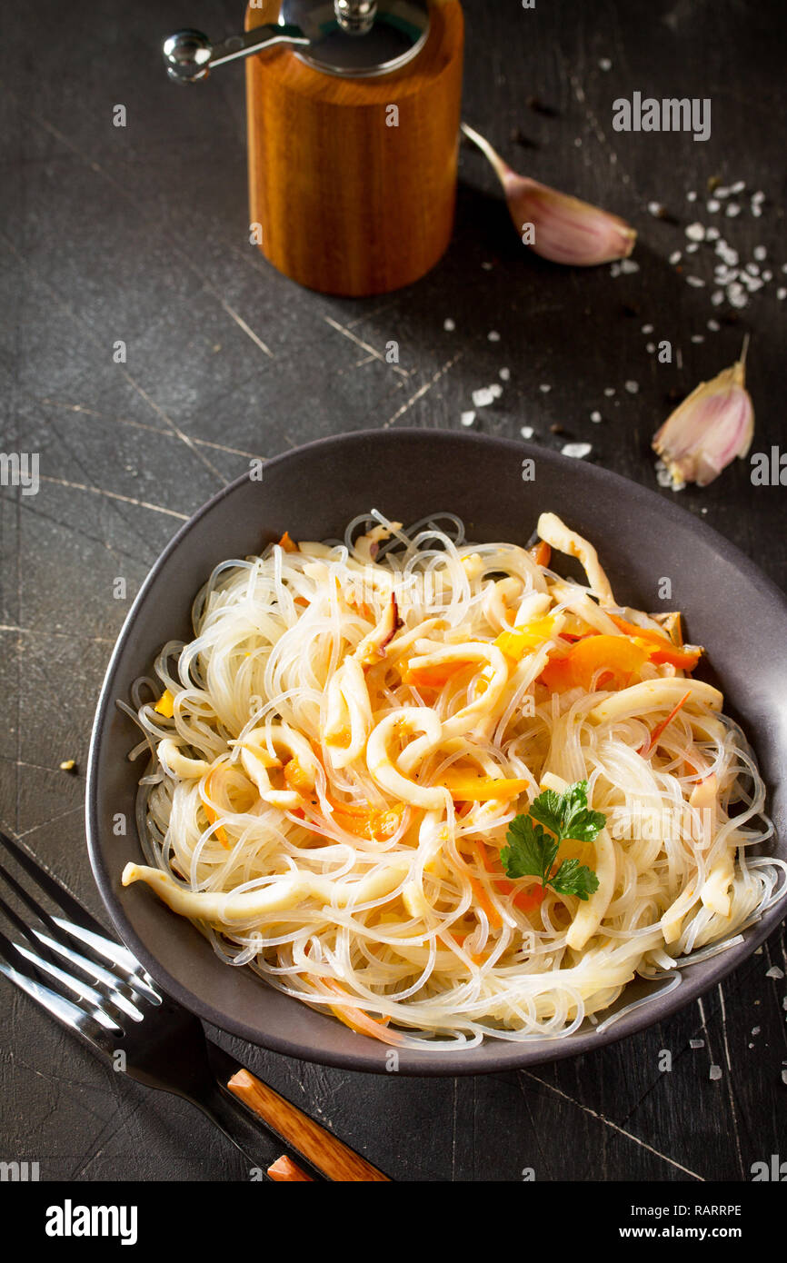 Asian food, Funchoza salad with stir fry Squids and Vegetables, copy ...