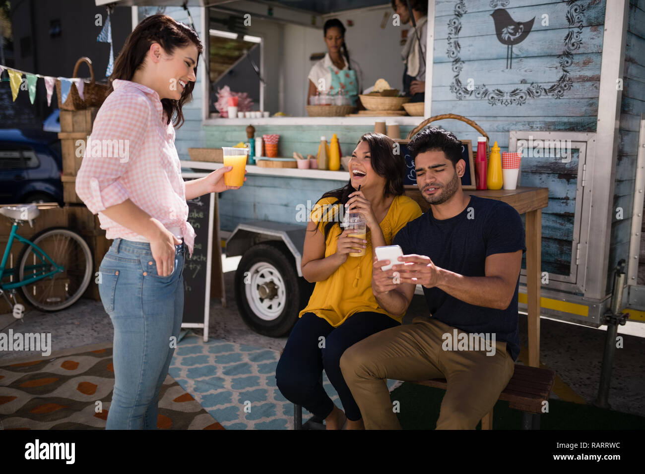 Young friends interacting other hi-res stock photography and images - Alamy