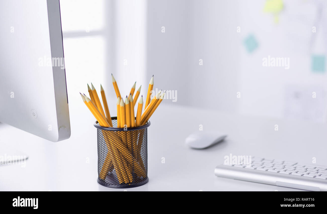 Graphite pencils in a metal grid-container. Concept Stock Photo - Alamy