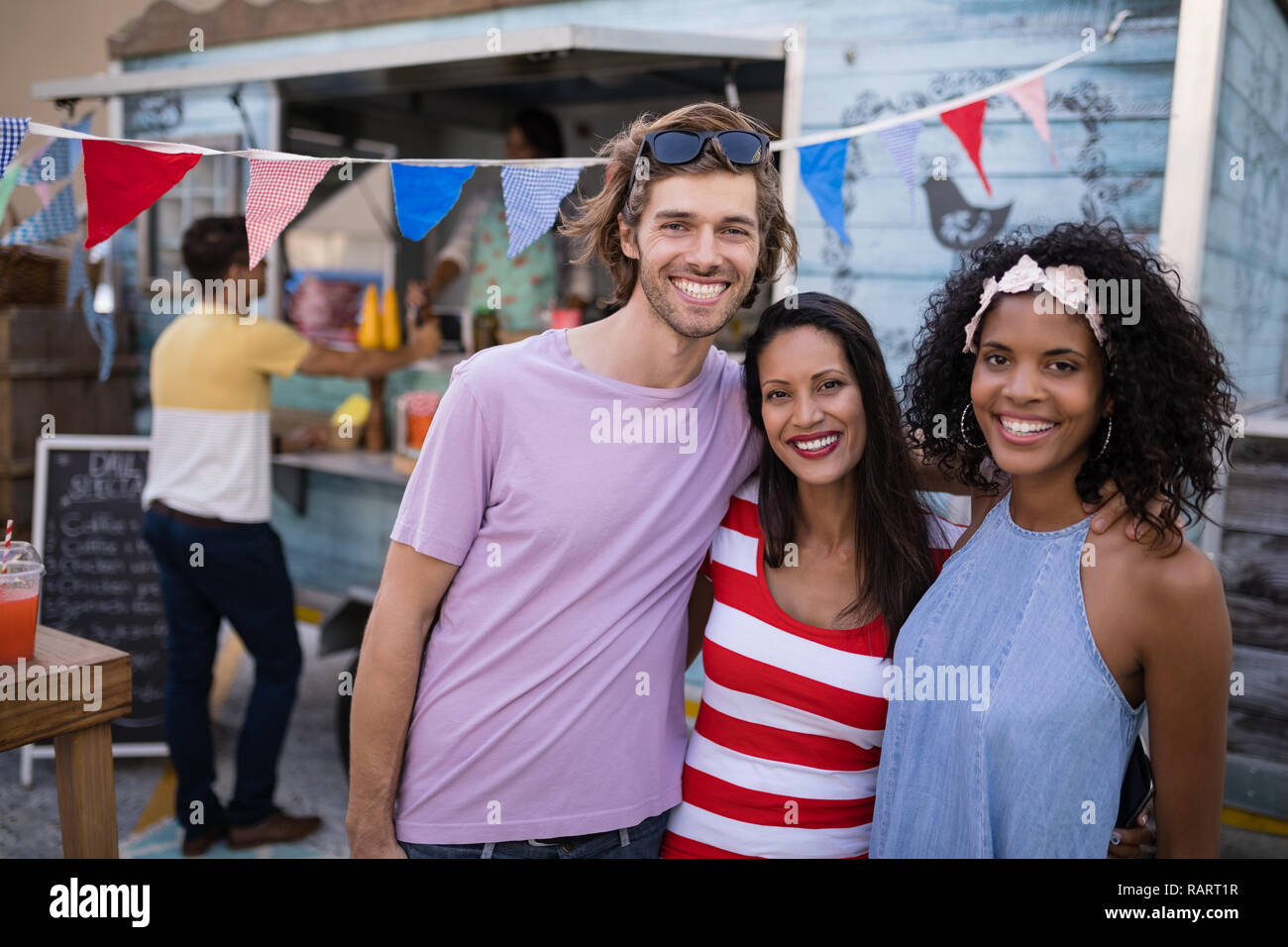 Casual friends arms up hi-res stock photography and images - Alamy