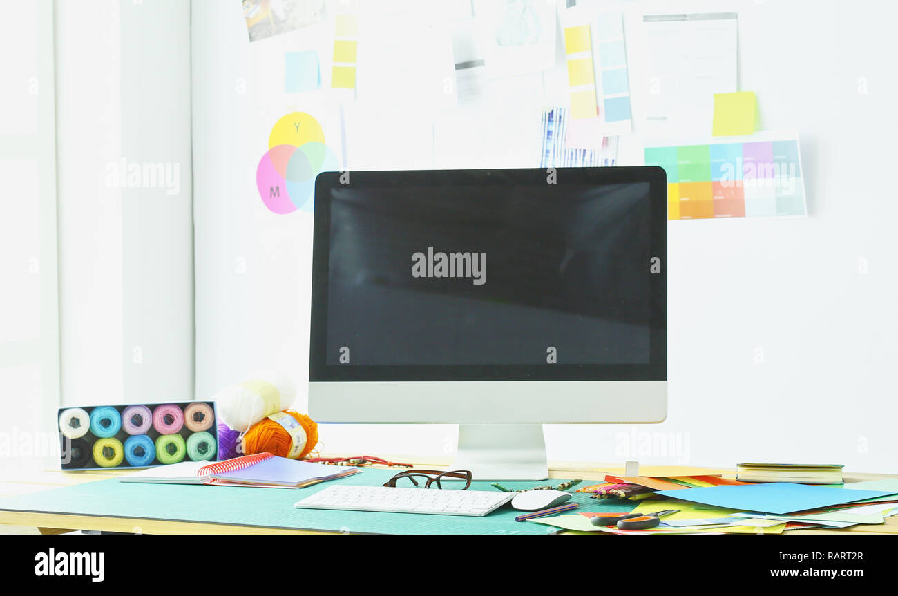 Empty workroom and workplace of tailor or vendor of clothes in small ...