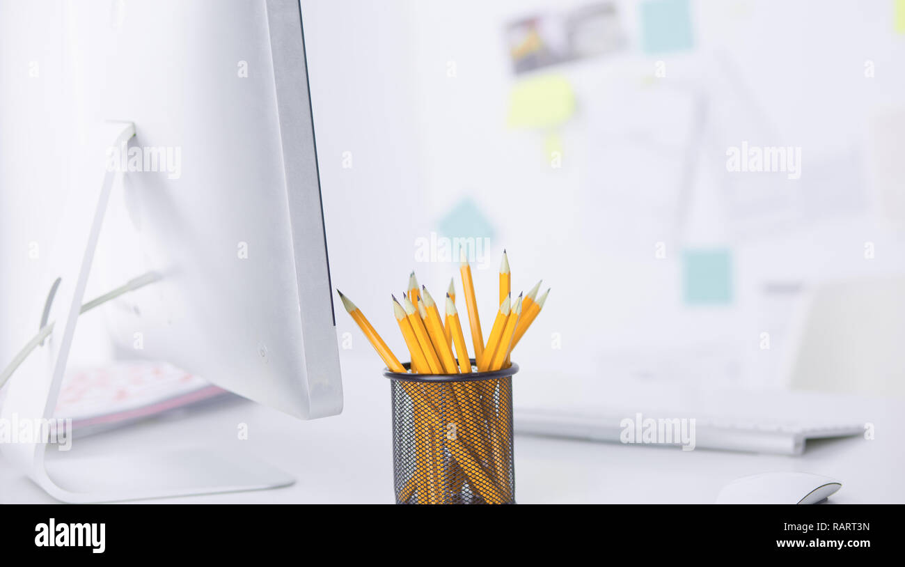Graphite pencils in a metal grid-container. Concept Stock Photo - Alamy