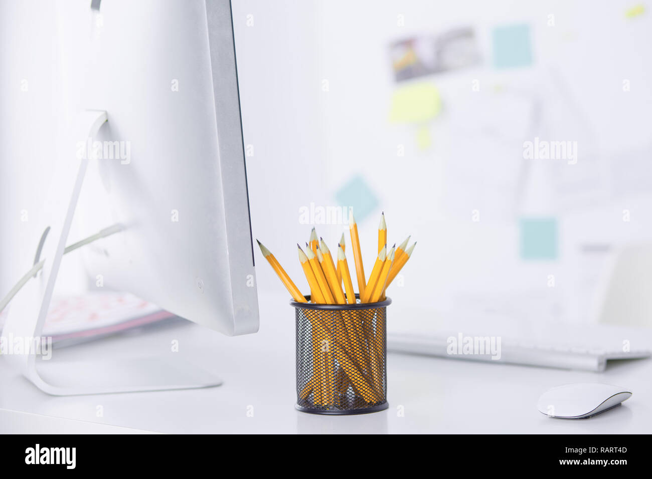 Graphite pencils in a metal grid-container. Concept Stock Photo - Alamy