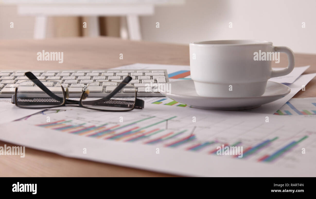 A cup of coffee on the office table Stock Photo - Alamy