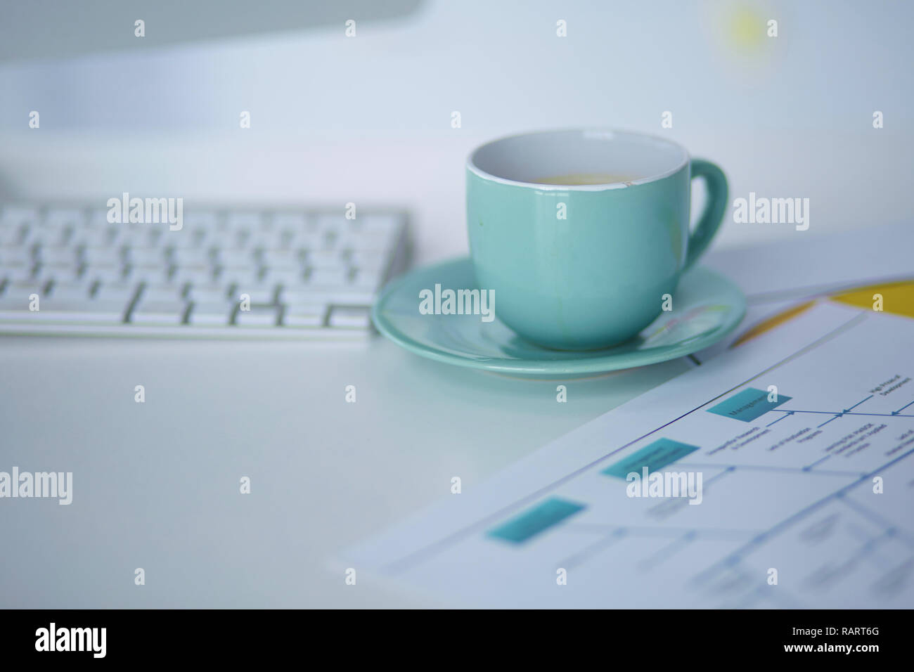 A cup of coffee on the office table Stock Photo - Alamy