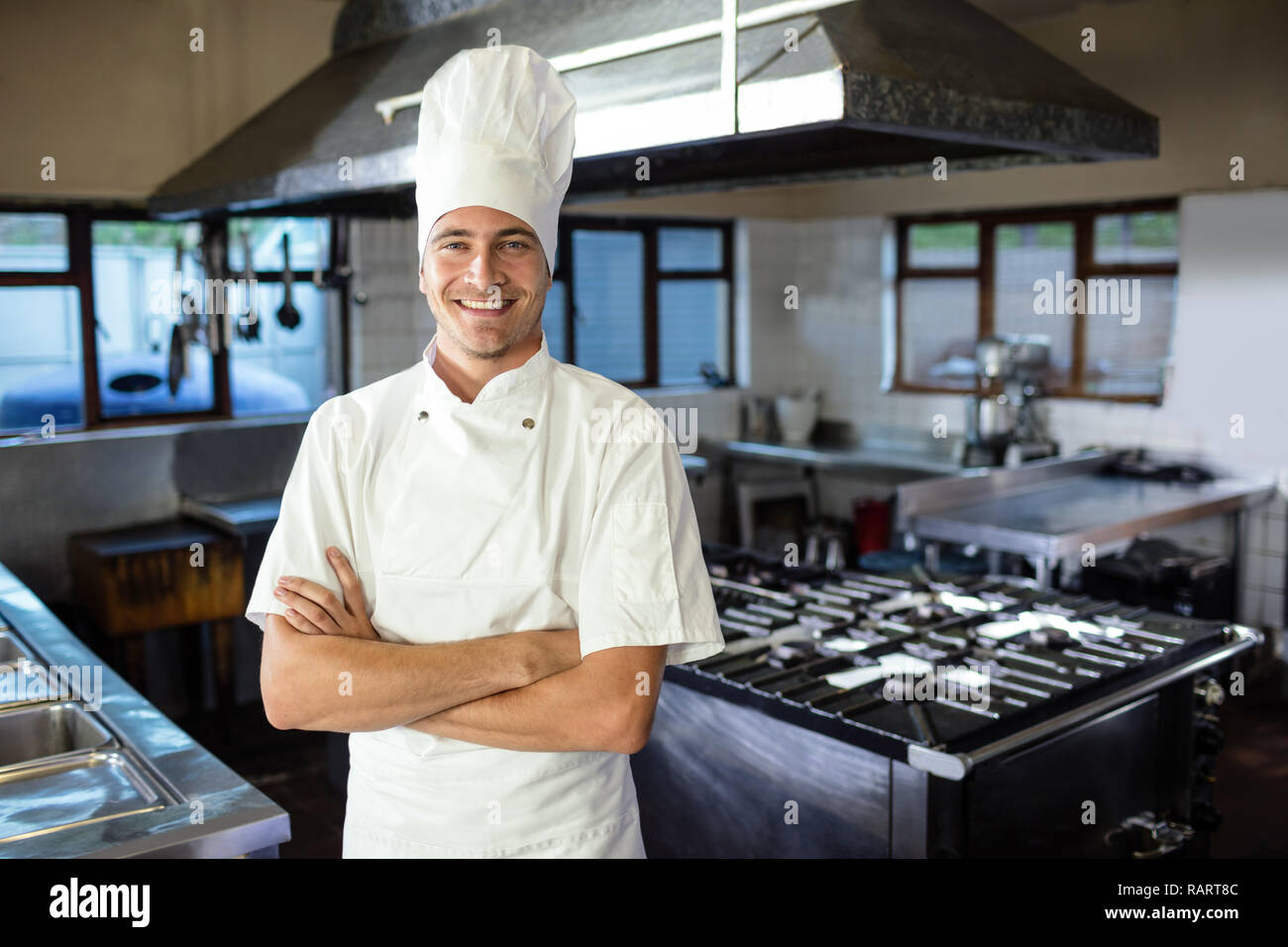 Male chef standing arms hi-res stock photography and images - Alamy