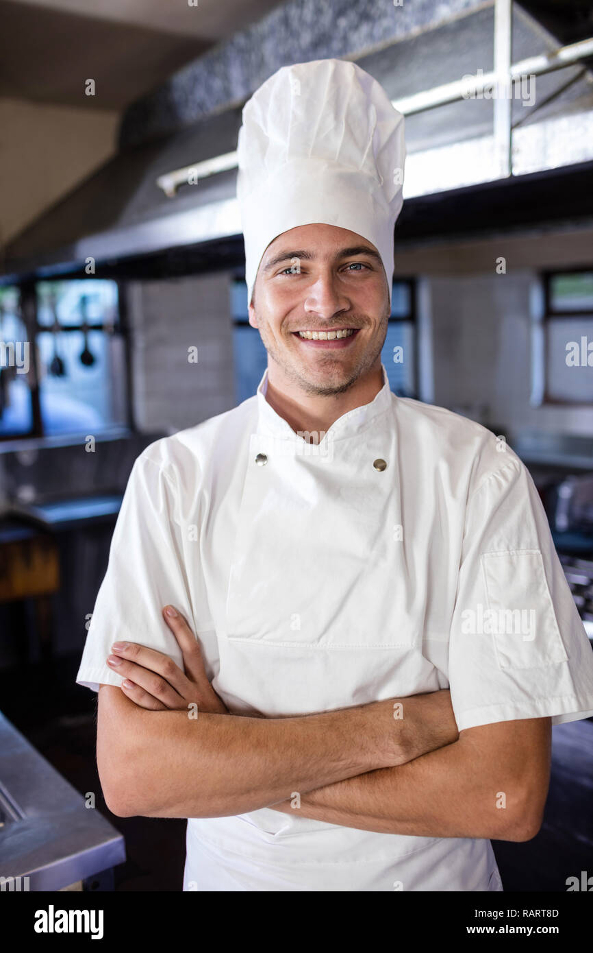 Male chef standing arms hi-res stock photography and images - Alamy