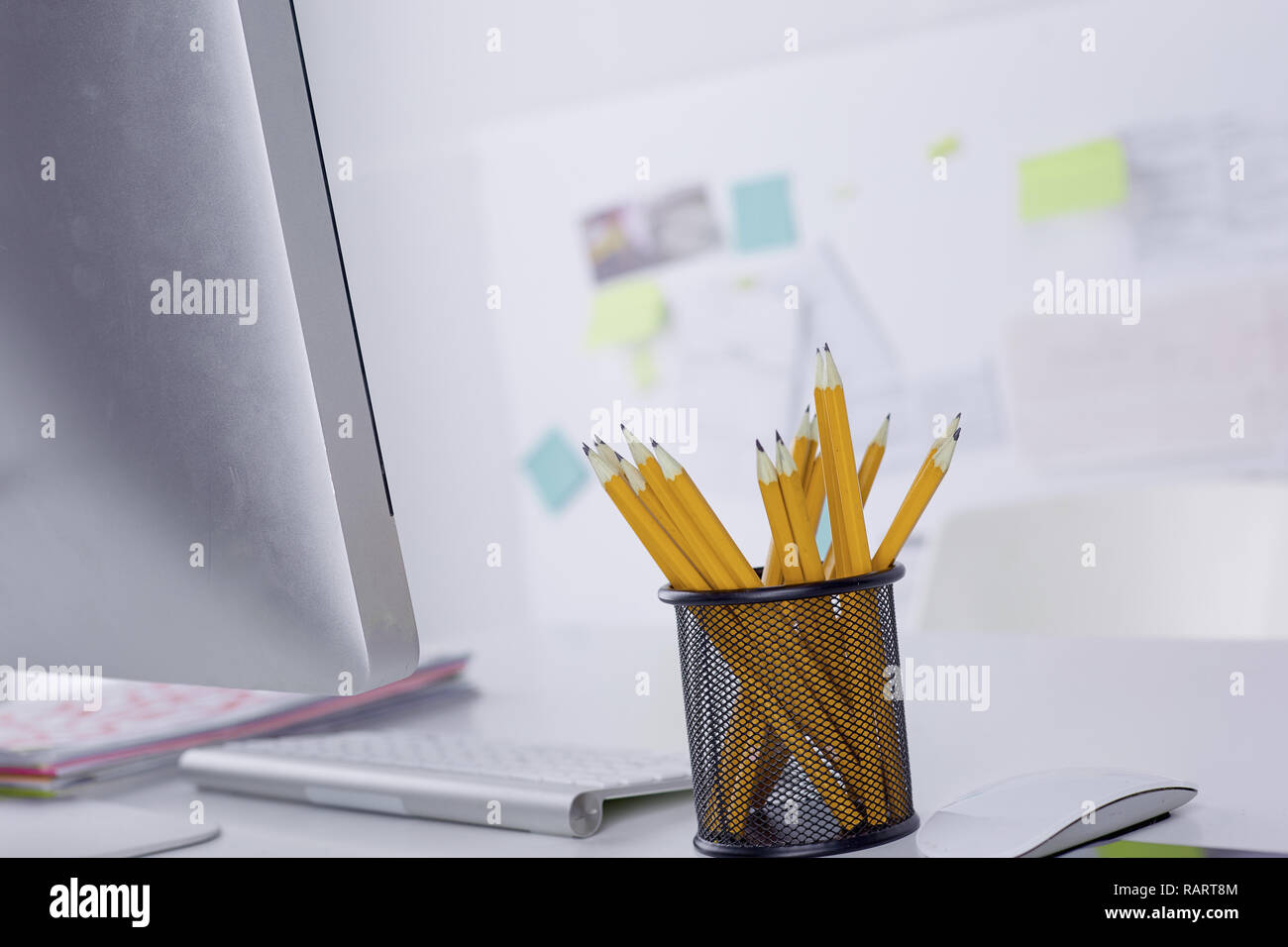 Graphite pencils in a metal grid-container. Concept Stock Photo - Alamy