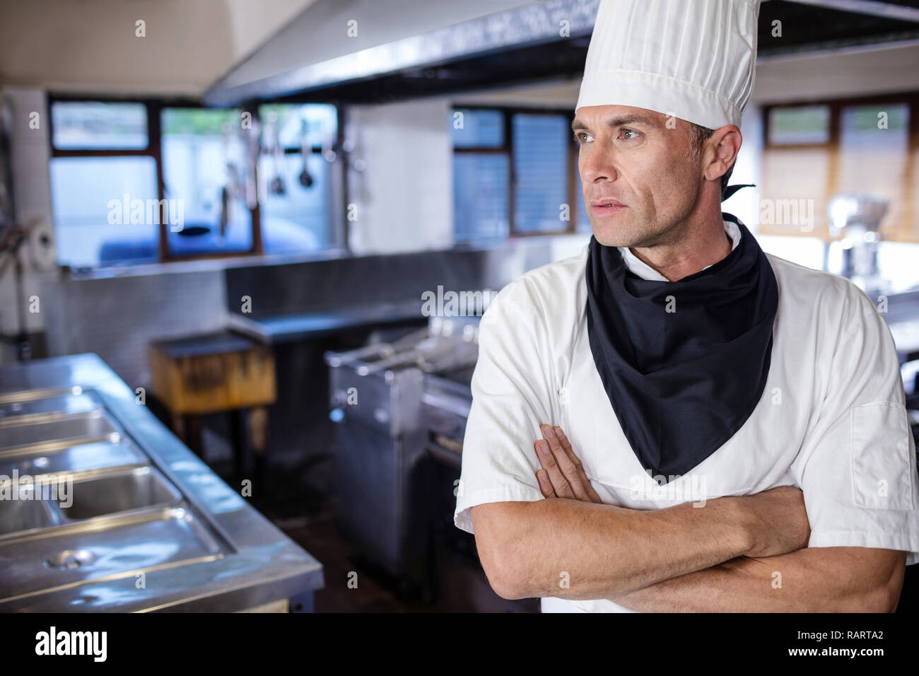 Male chef standing arms hi-res stock photography and images - Alamy
