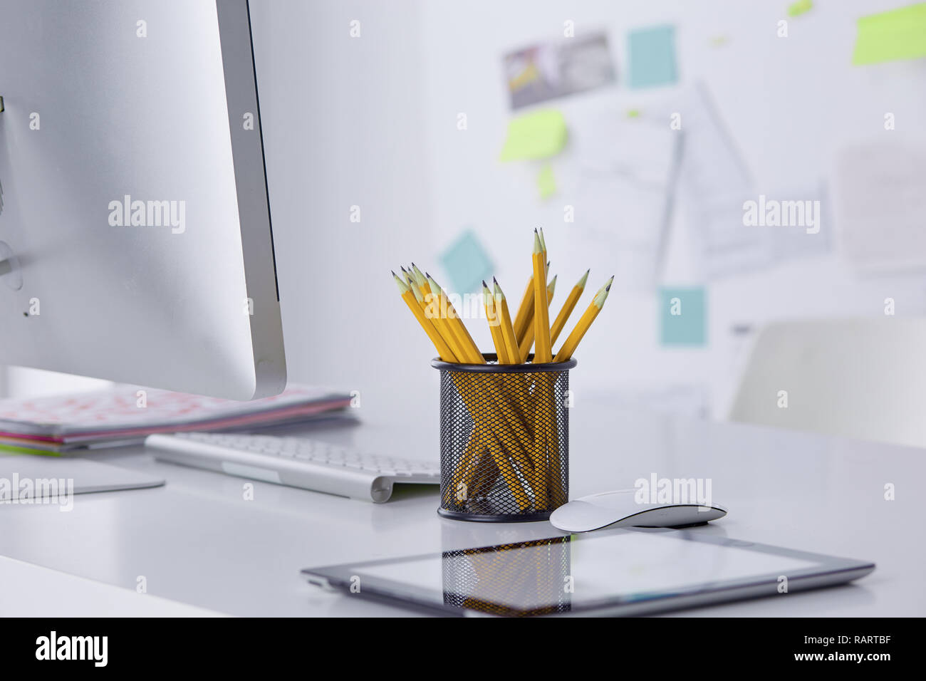 Graphite pencils in a metal grid-container. Concept Stock Photo - Alamy