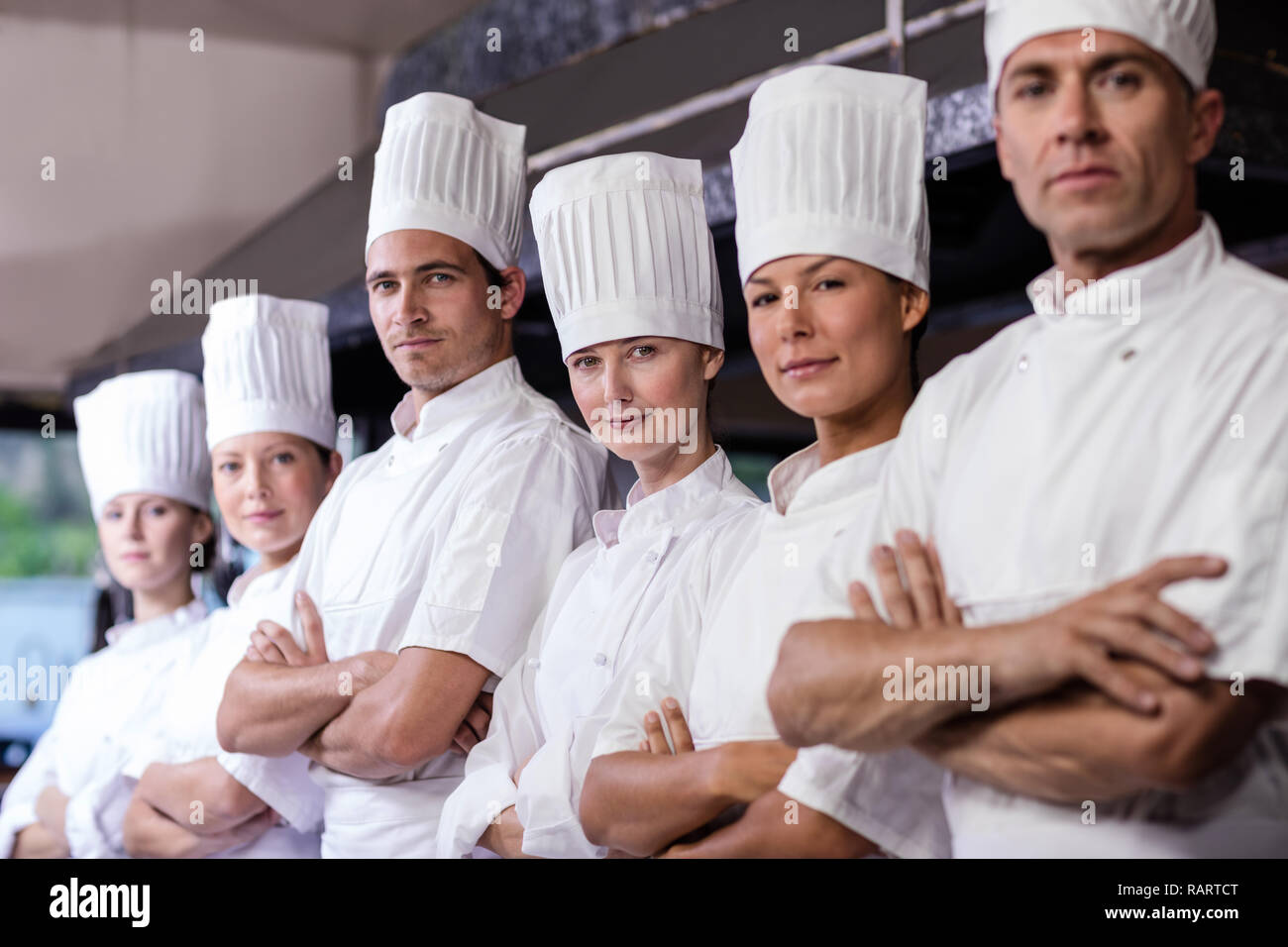 Group of chefs standing in kitchen Stock Photo - Alamy Group of chefs standing in kitchen Stock Photo - Alamy
