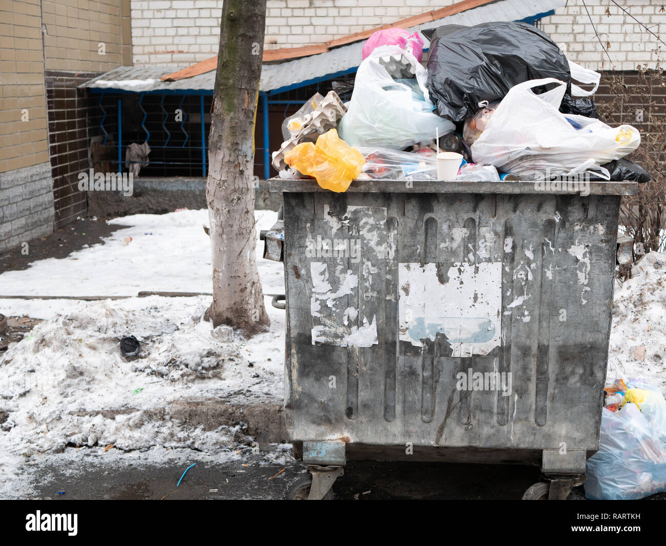 big waste city container full of garbage. pile of trash. bad utilities ...