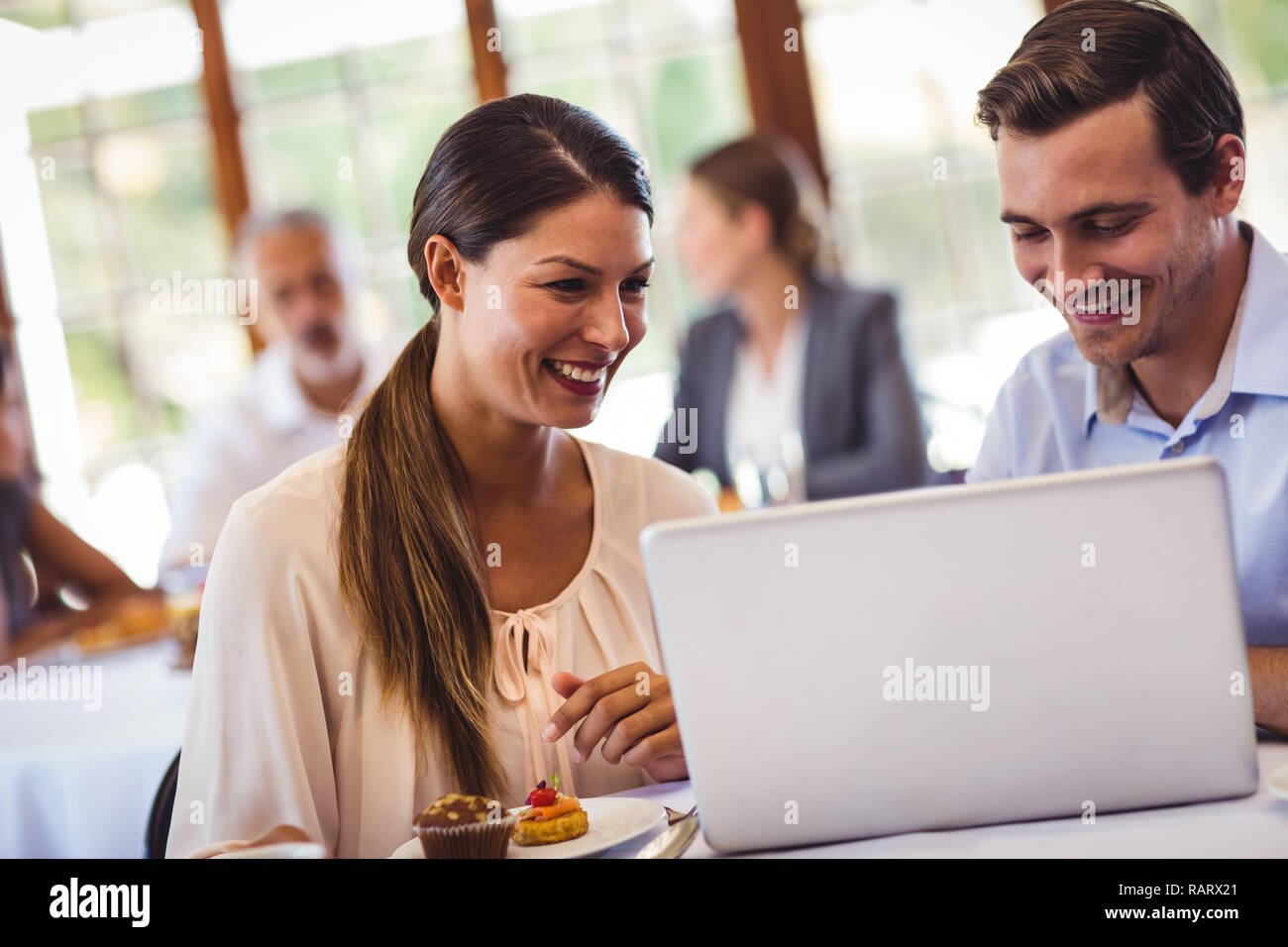 Couple table touching hi-res stock photography and images - Alamy