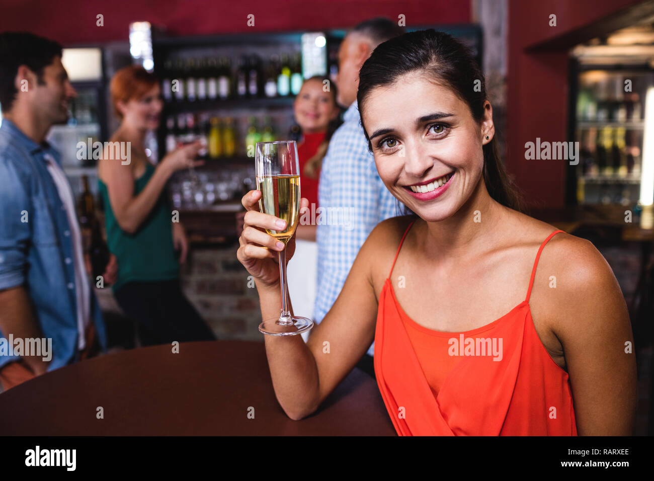 Woman standing night club hi-res stock photography and images - Alamy