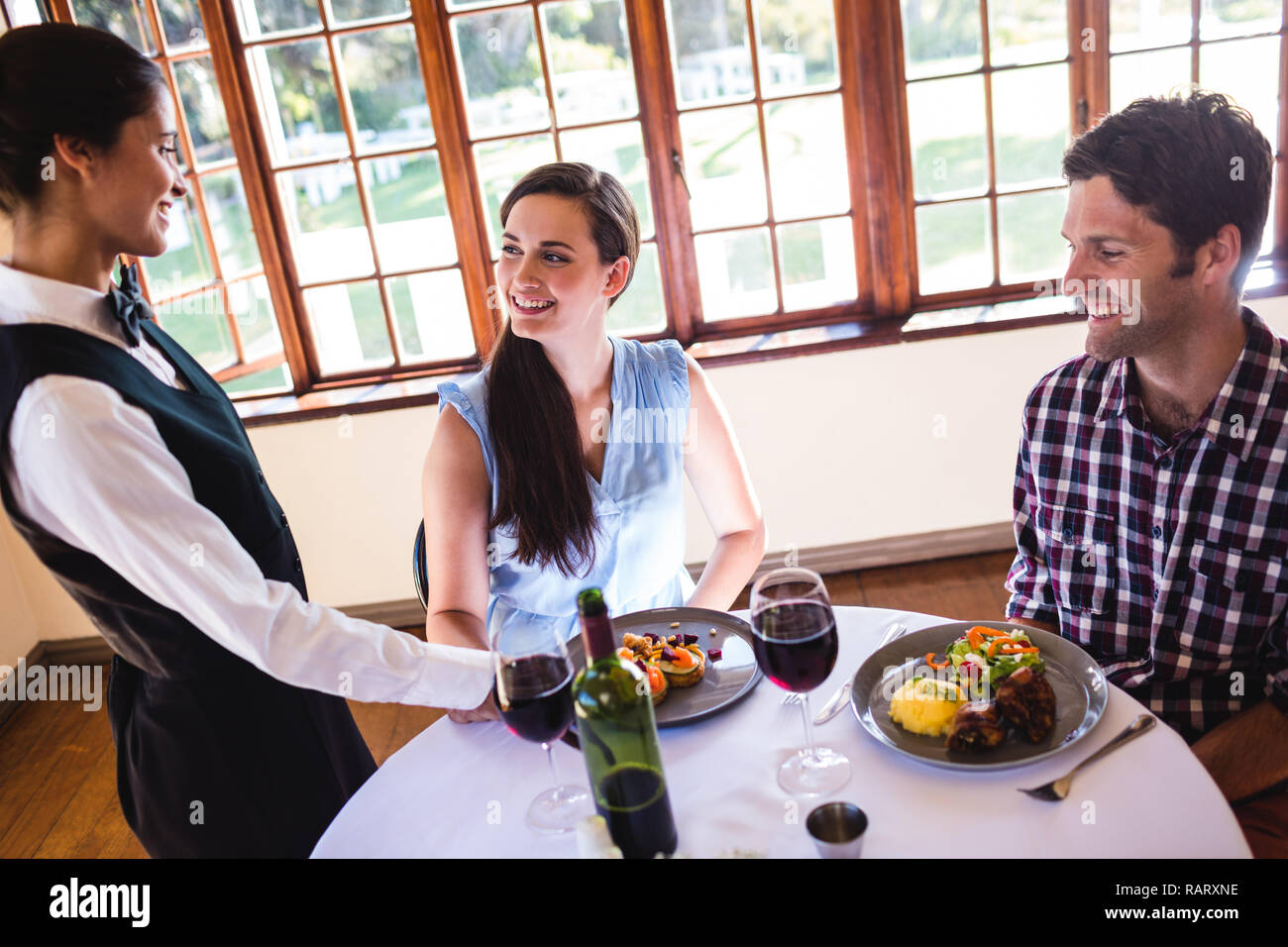 Female waitress customers hi-res stock photography and images - Alamy