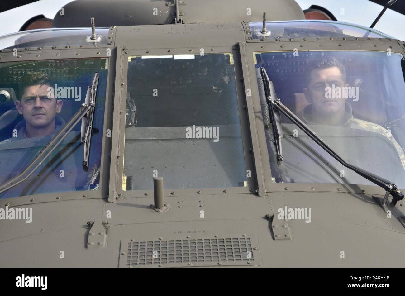 Chief Warrant Officer 4 Justin Larson (Left) and Chief Warrant Officer ...