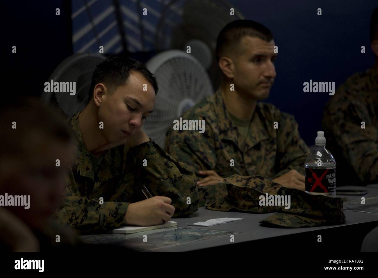U.S. Marine Corps Sgt. Zachary N. Flojo, left, with the Recruit ...